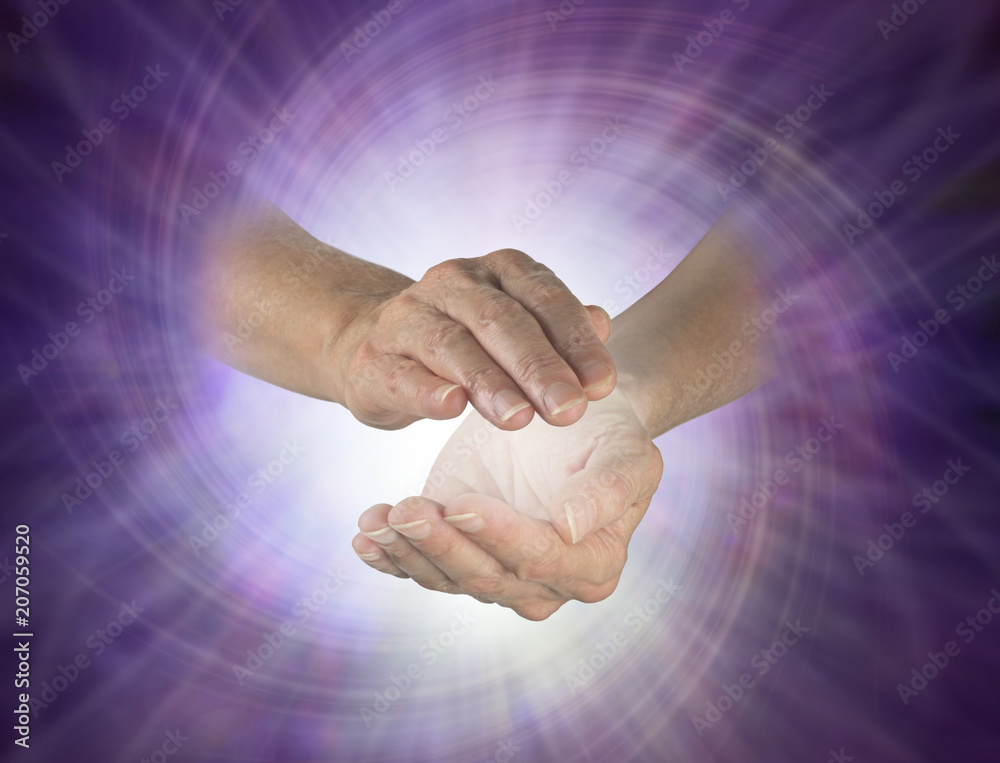 Vortex spiralling between hands - female cupped hands with white vortex ...