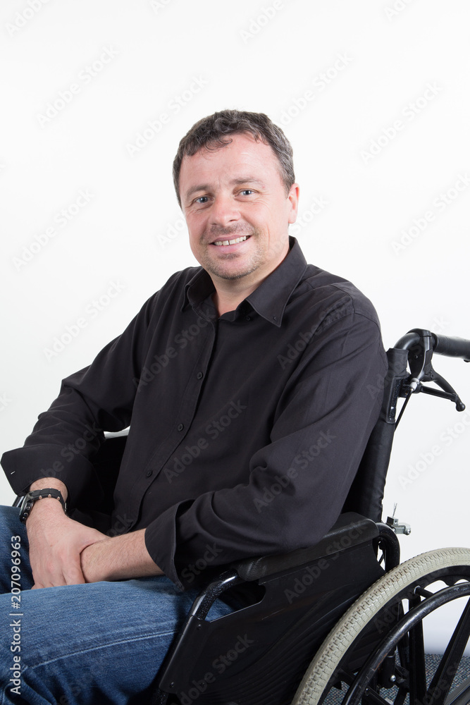 disabled handsome man in wheelchair paraplegic in white background ...