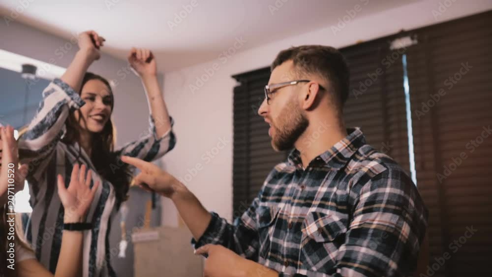 Happy successful businessman dancing crazy at fun corporate celebration ...