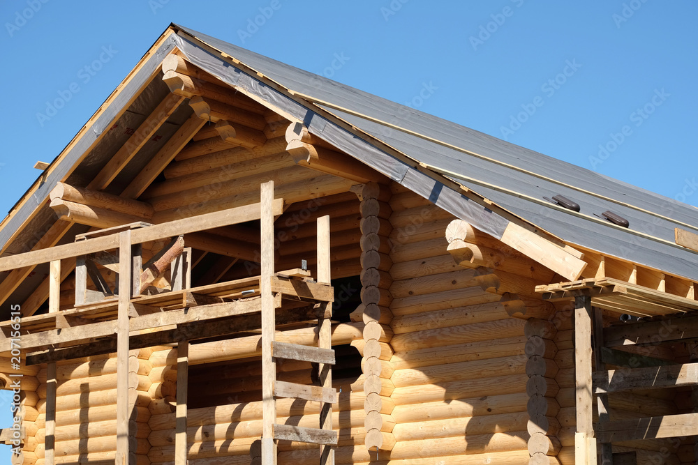 Process of wooden rural house straight roof slope mounting front view ...