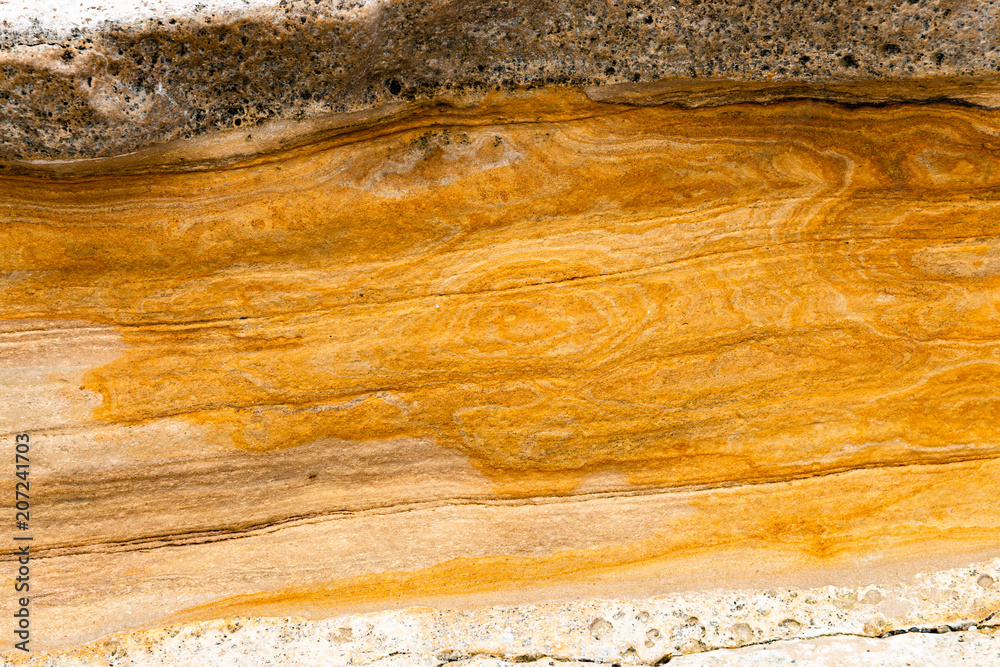 Compressed rock layers texture in various colors and thicknesses, on ...