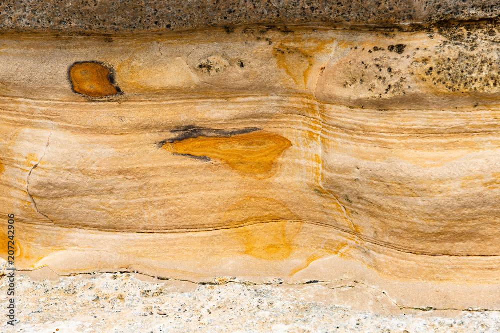 Compressed rock layers texture in various colors and thicknesses, on ...