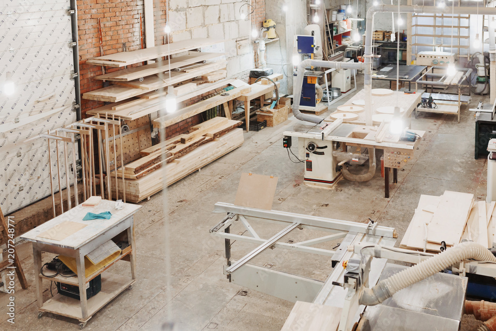 Background image of empty carpenters workshop: production equipment ...
