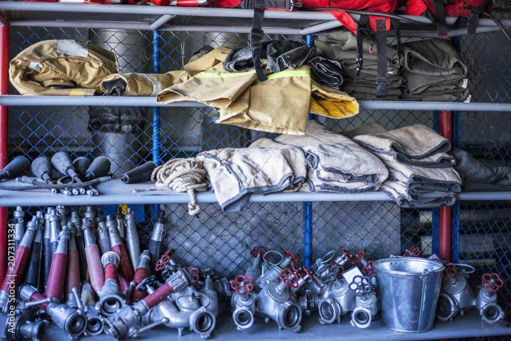 Fire safety. A rack with emergency stock for extinguishing a fire ...