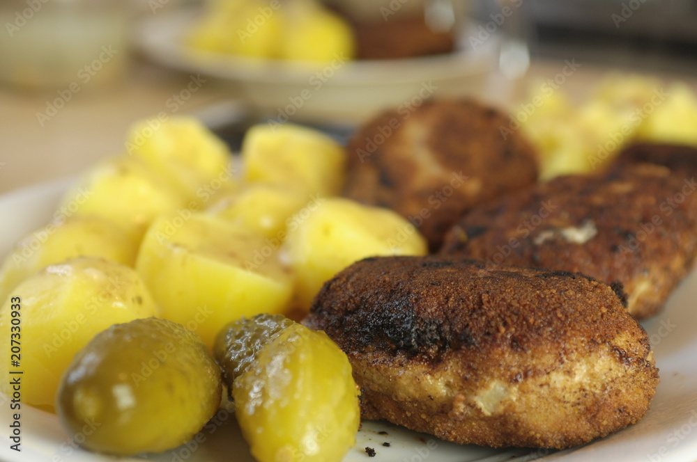 Obiad po polsku, mielony z ziemniakami i ogórkiem Stock Photo | Adobe Stock