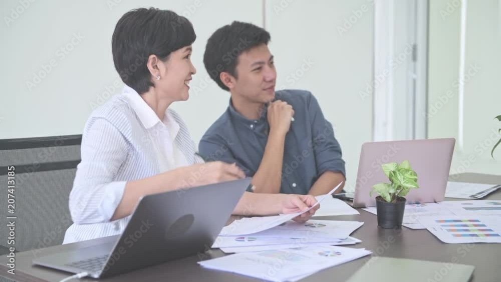 Business meeting. Small start up business meeting in room. Asian team ...