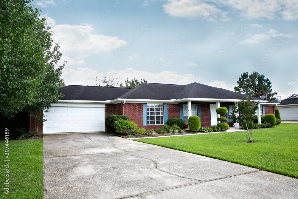 1980's Brick Ranch Style House in the Suburbs Stock Photo | Adobe Stock