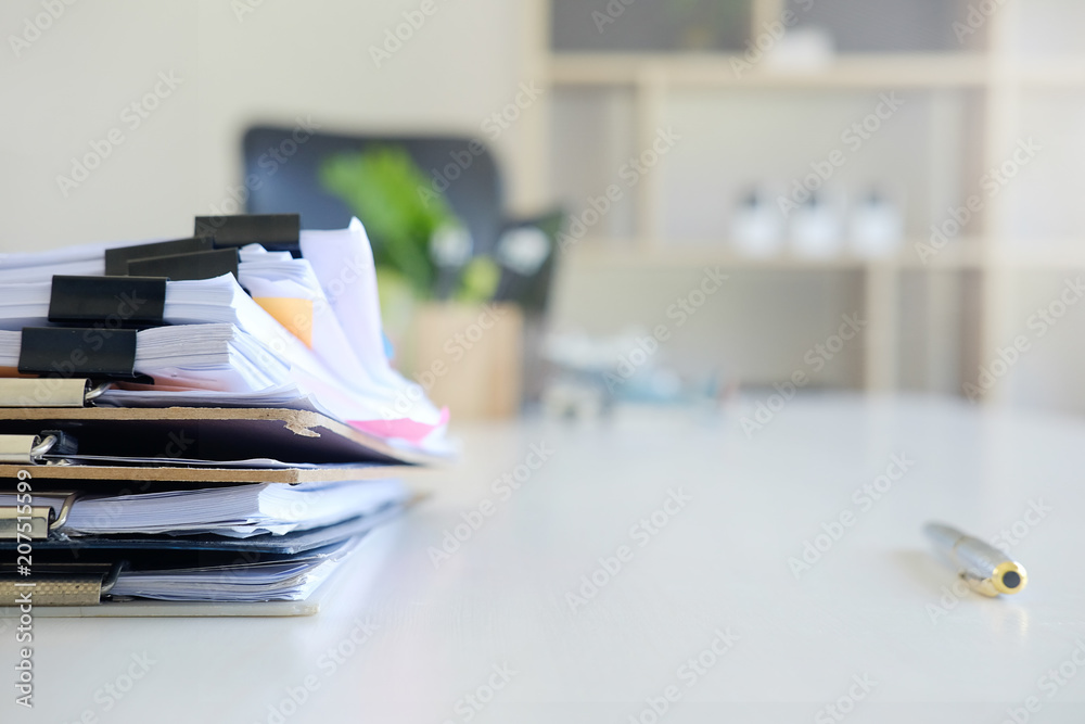Stack of paper files and pen business equipment on office table. Stock ...
