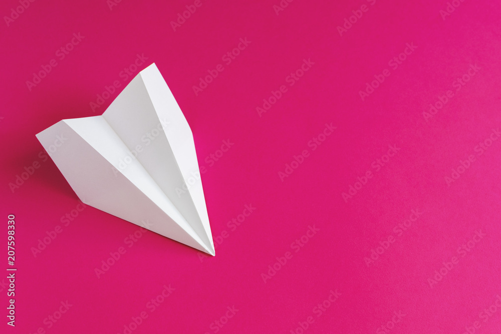 paper plane on pink background Stock Photo | Adobe Stock