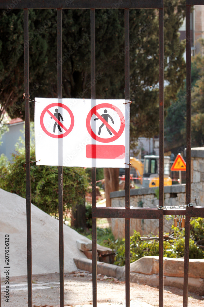 Sign of authorized personnel only at construction site. Red, black and ...