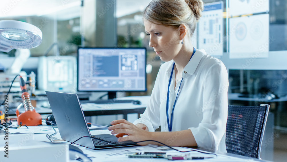 Female Computer Scientists Connects Circuit Board to Her Laptop and ...