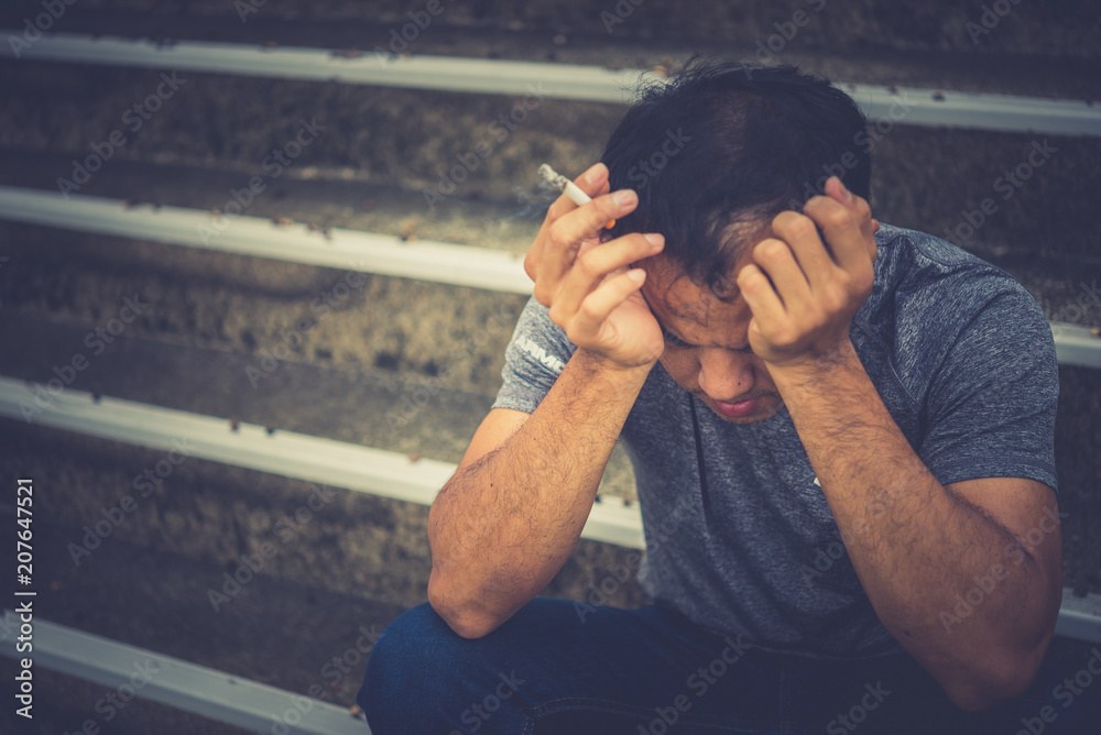 Asian stress handsome man smoking,Thailand people,Depressed man concept ...