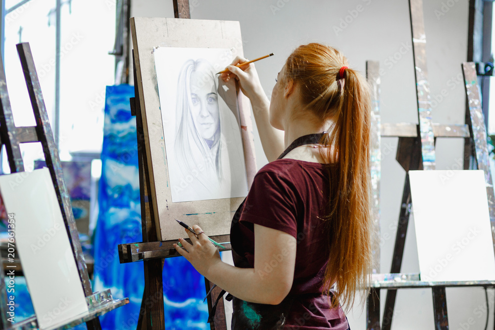 art, creativity and people concept - artist with graphite pencil ...