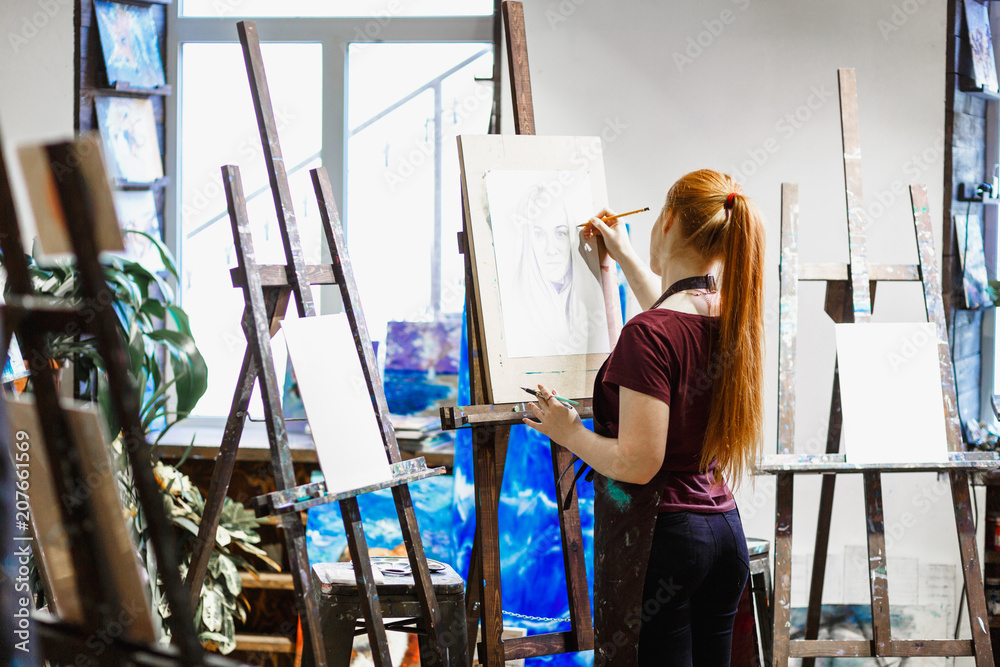 art, creativity and people concept - artist with graphite pencil ...