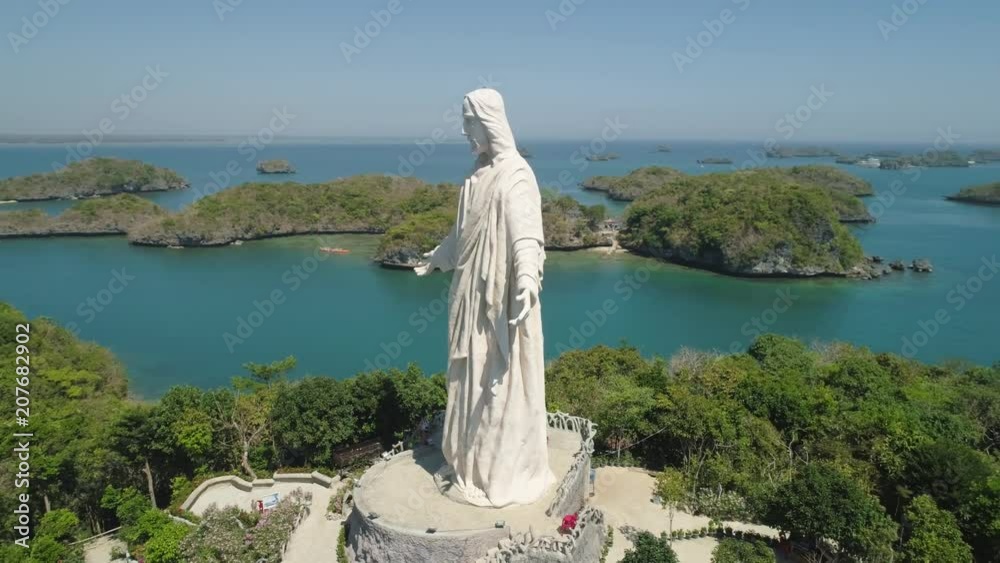Statue of Jesus Christ on Pilgrimage island in Hundred Islands National ...