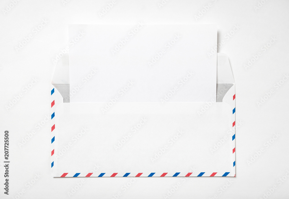 Open envelope with a sheet of paper. Blank airmail envelope with empty ...