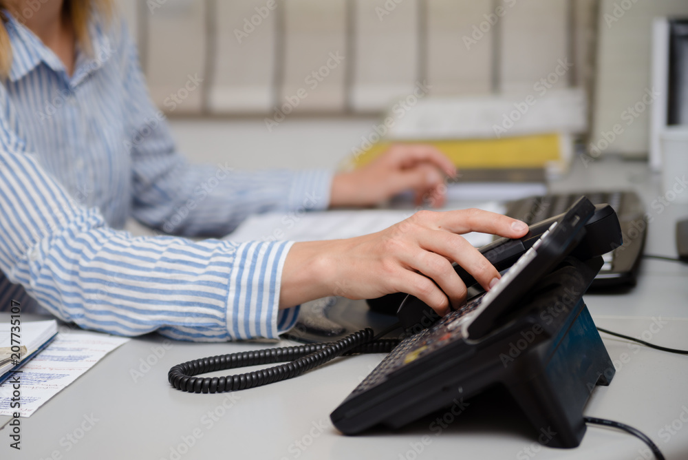 Closeup on busy office phone workplace, light table window. Modern ...