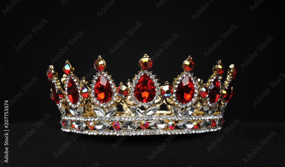 portrait of a beautiful jewelled ruby, diamond and golden crown ...