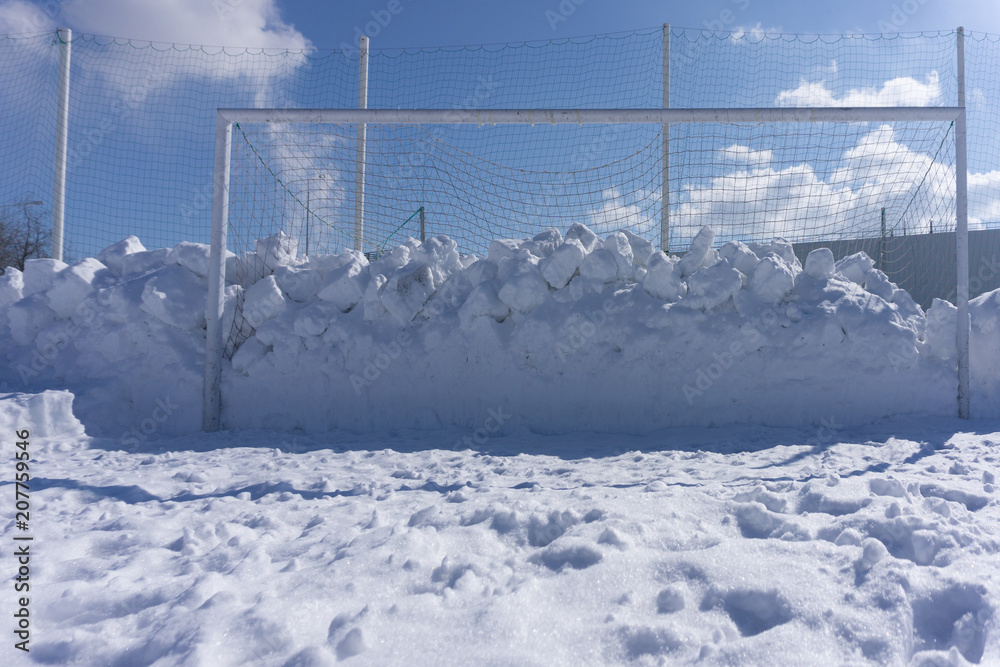 Football pitch soccer field in winter snow . Stock Photo | Adobe Stock