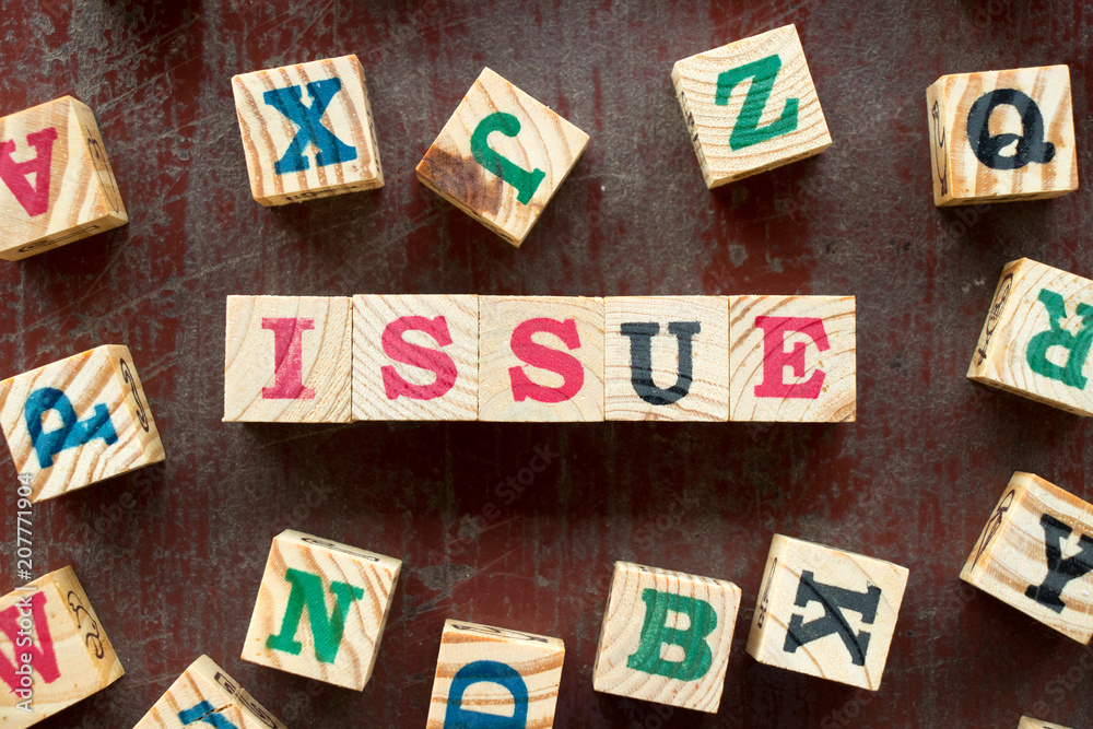 Letter block in word issue with another on old red wood background ...