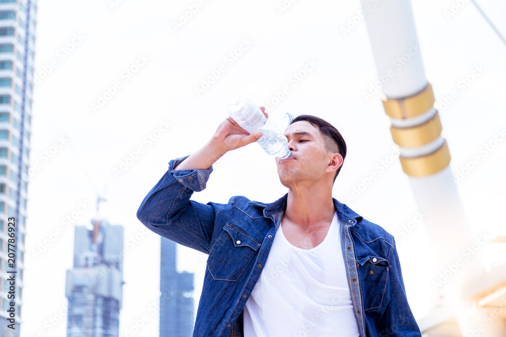 Portrait handsome cool guy. Attractive handsome young guy feels thirsty ...