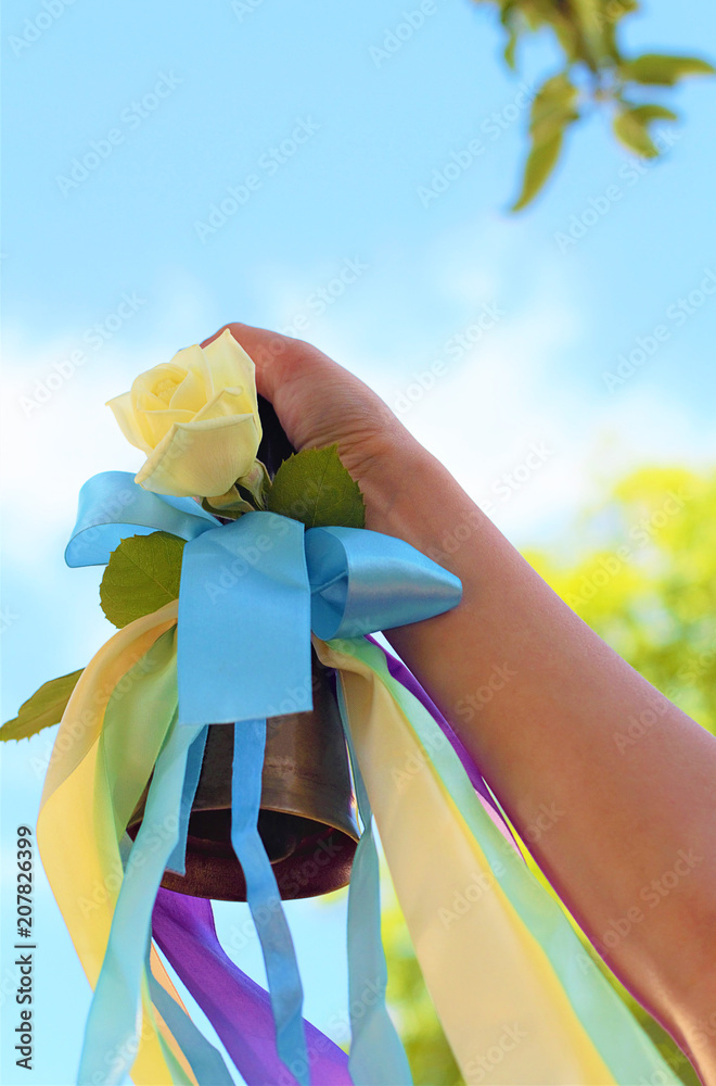 School. The last call or September 1st. Bell in the hands of the child ...