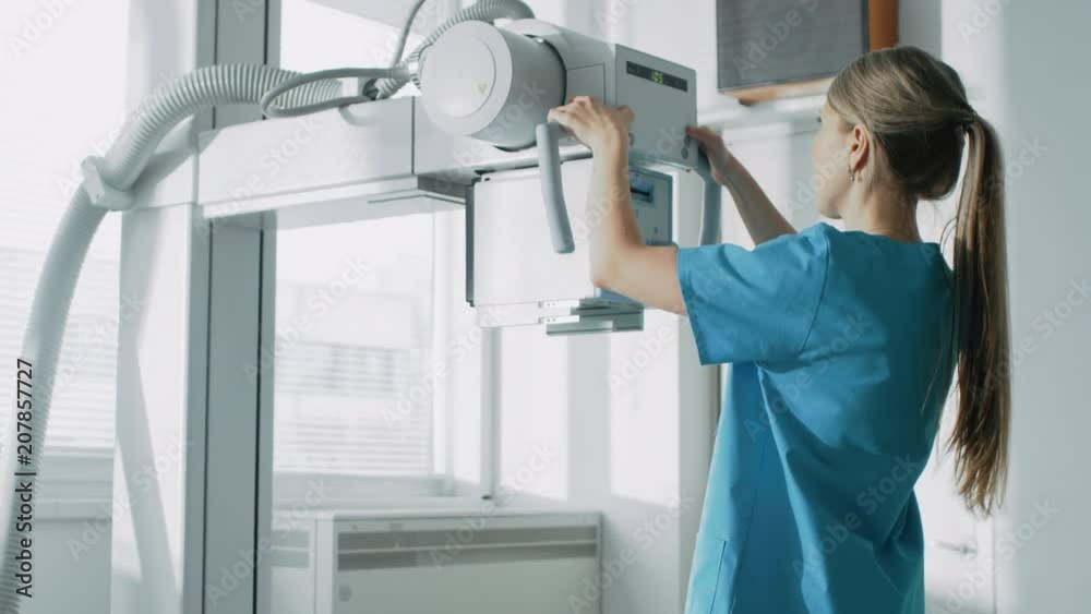 Vídeo do Stock: In the Hospital, Man Lying on a Bed, Female Technician ...