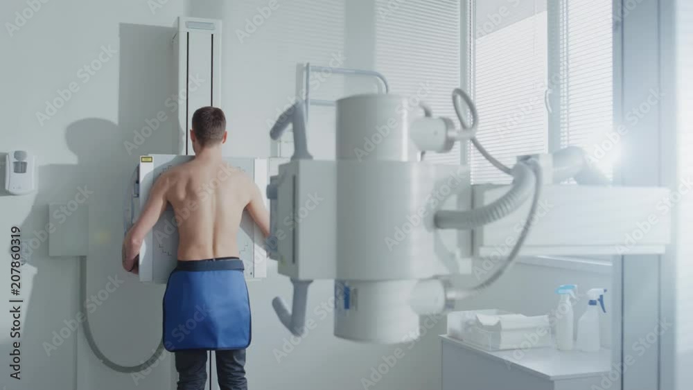 In the Hospital, Man Standing Face Against the Wall While Medical ...