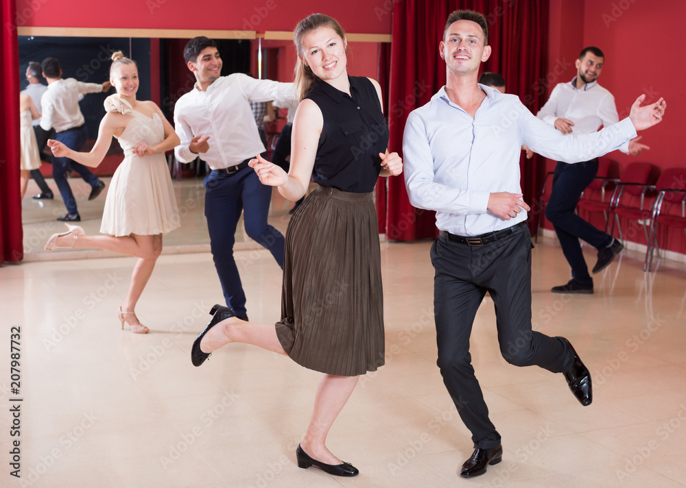 People dancing twist Stock Photo | Adobe Stock