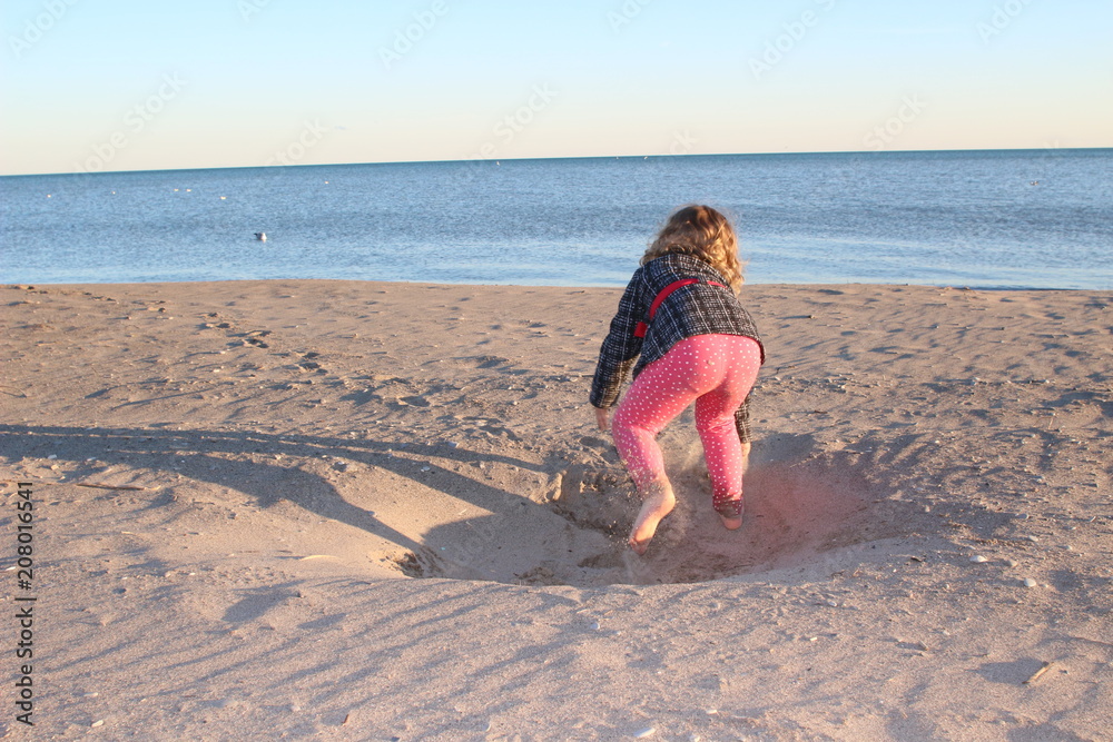 Digging A Hole At Beach