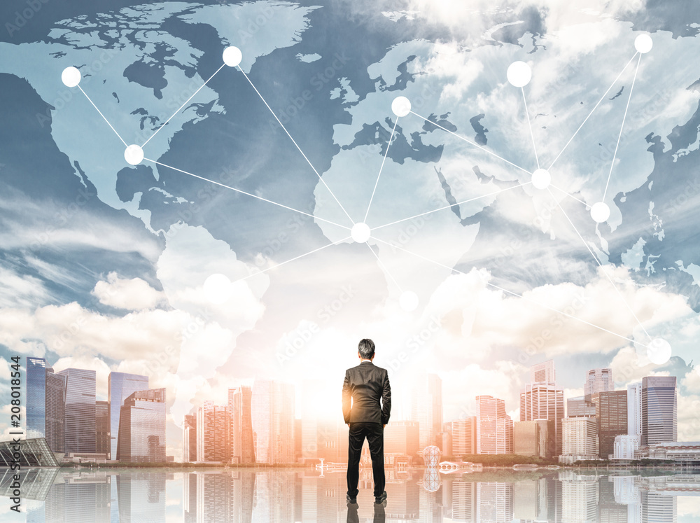 Businessman looking at global business with city background Stock Photo ...