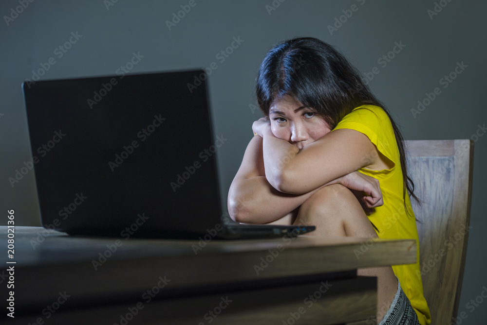 young pretty shocked and surprised Asian Korean woman looking stressed ...
