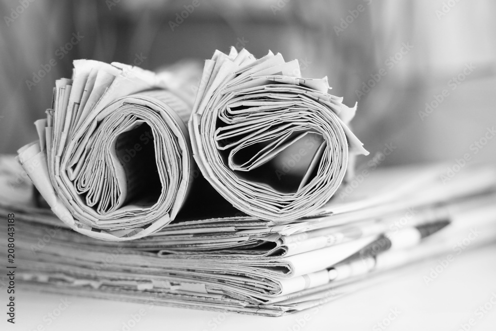 Pile Of Rolled Newspapers