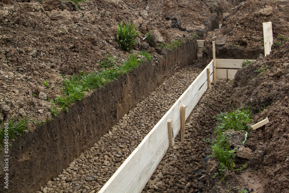 Foto de cut soil and rubble at the bottom of the trench dug under the ...