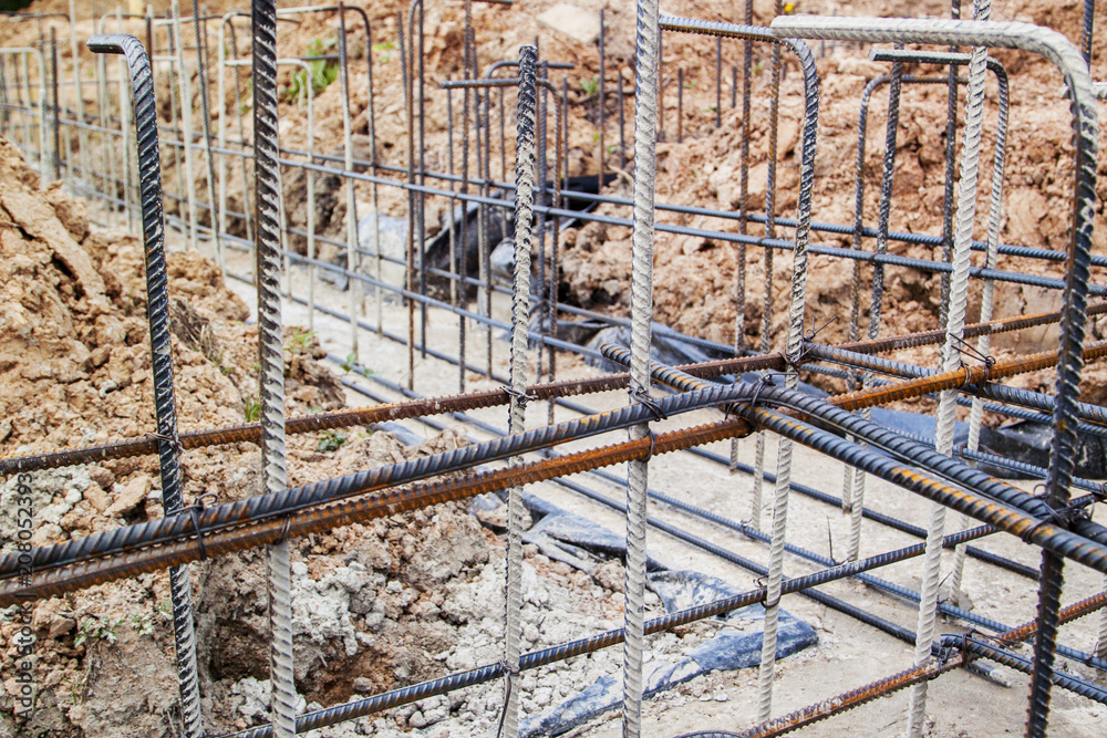 reinforcement of concrete with metal rods connected by wire ...