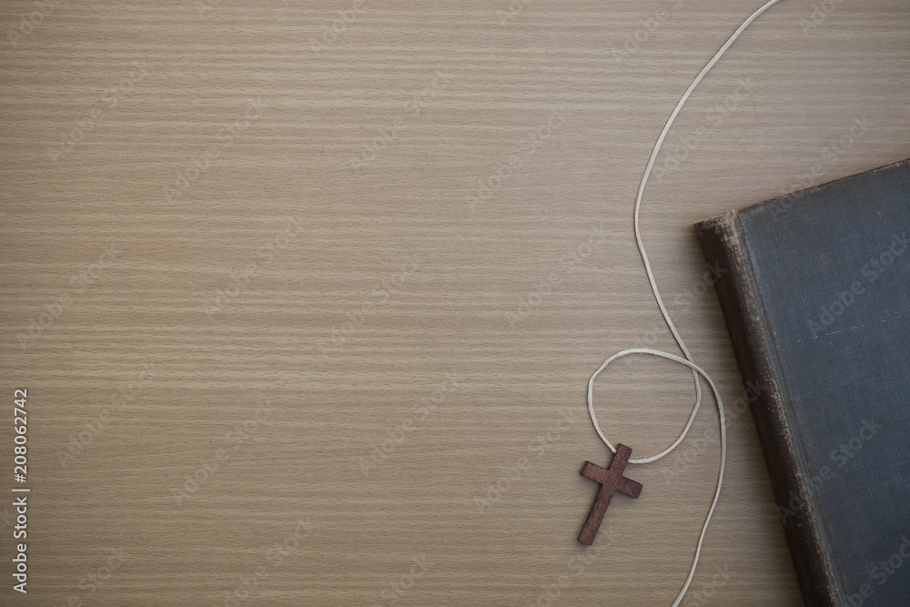 Cross with Bible, wooden christian cross and bible on the old wooden ...
