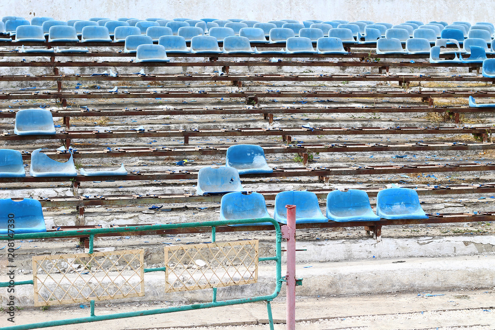 Broken seats in the stadium, the consequences of the riots of fans foto ...
