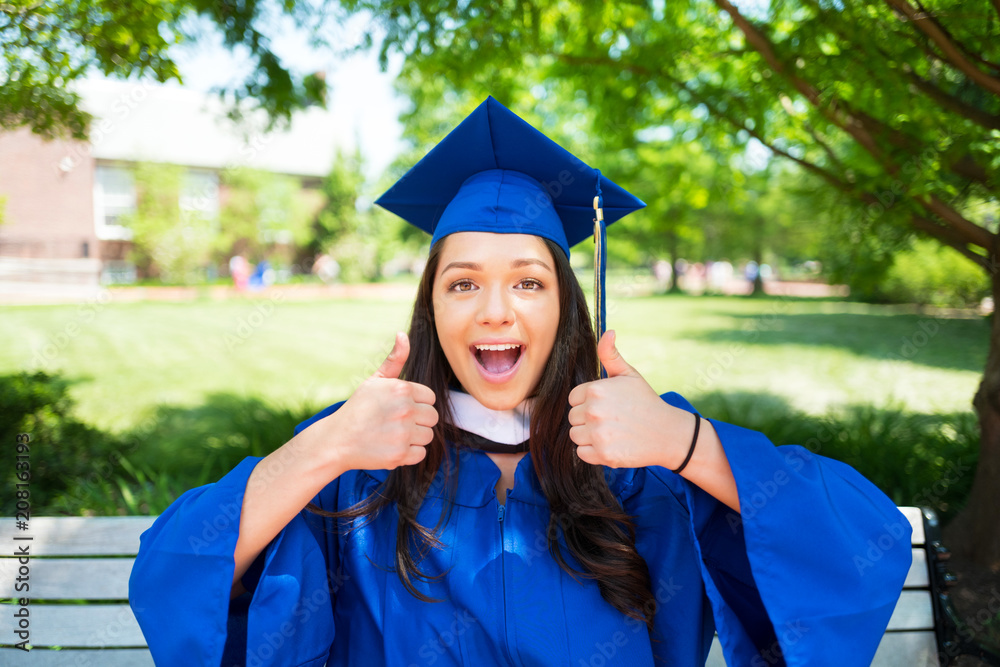 Thumbs up graduate Stock Photo | Adobe Stock