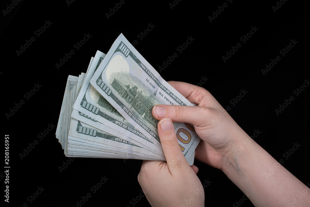 Hand holding American dollar isolated on white background Stock Photo ...