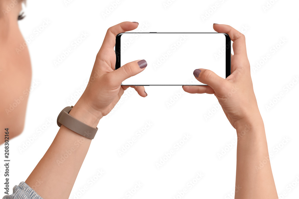 Female hands holding modern phone in horizontal position with isolated ...
