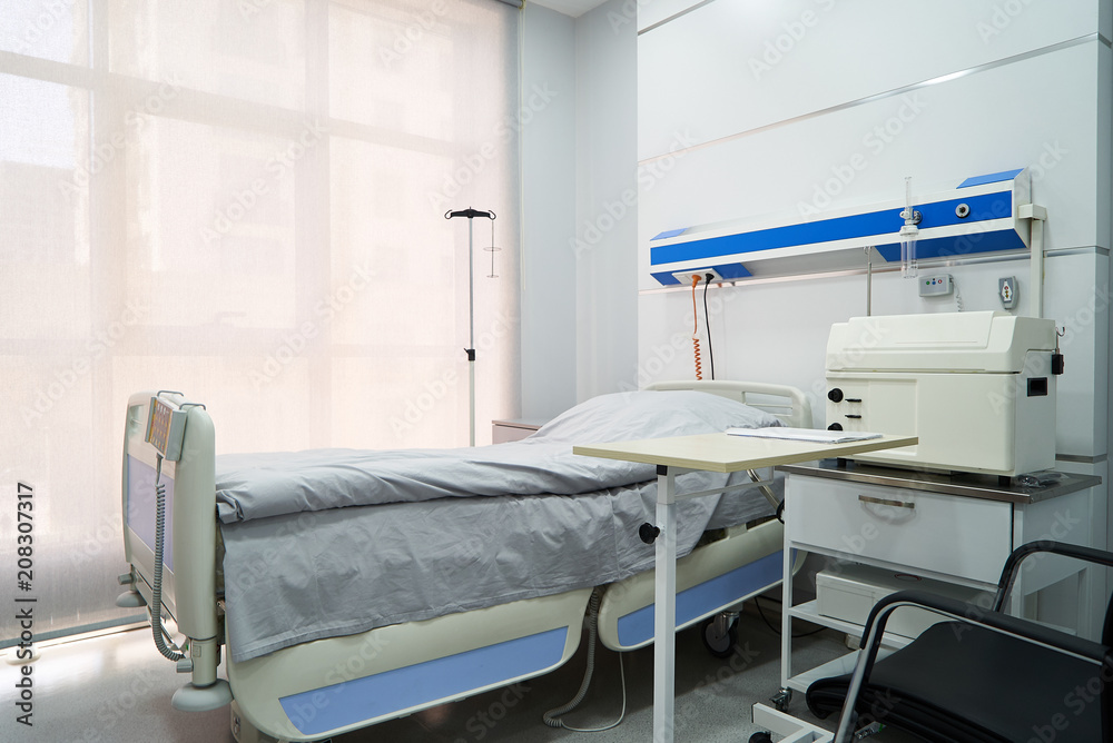 Empty Bed On Hospital Ward. Hospital room with bed and comfortable ...
