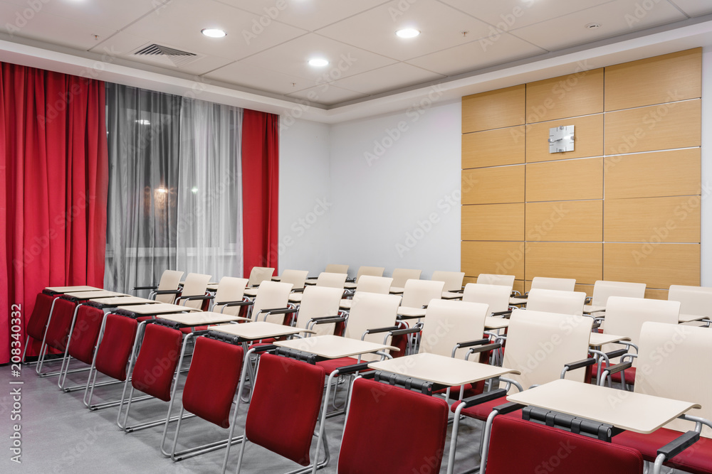 Seminar presentation. Empty conference room, lots of empty seats ...