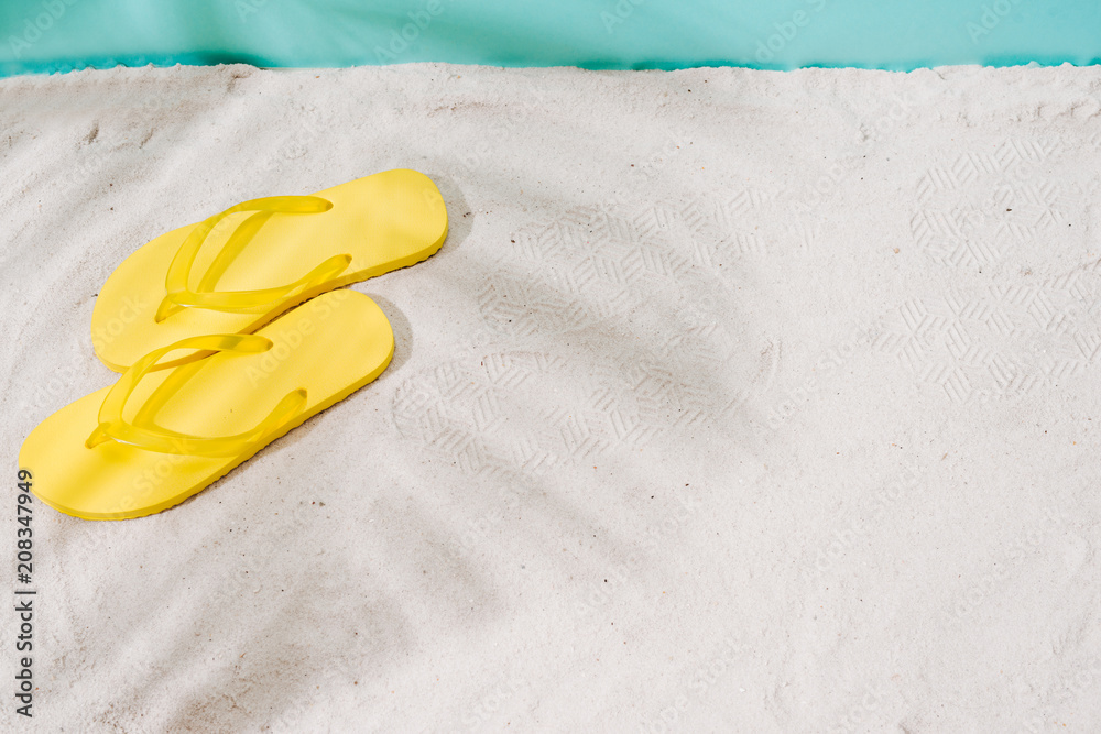 A Summer vacation background with a pair of sandals on beach Stock ...