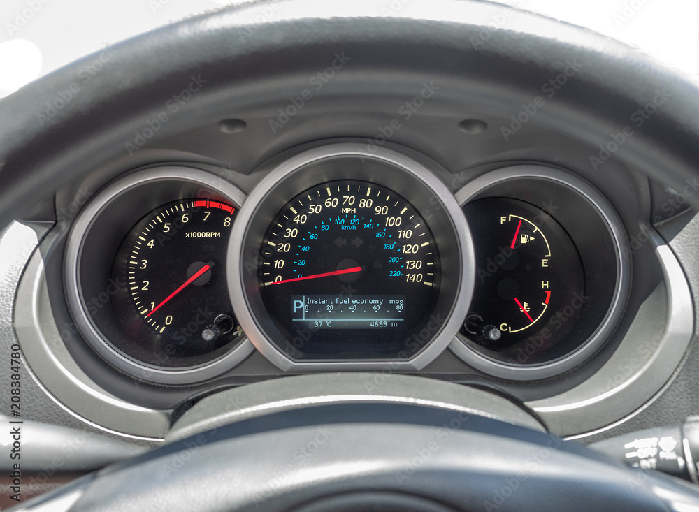 Car instrument panel. Dashboard closeup with visible speedometer,fuel ...