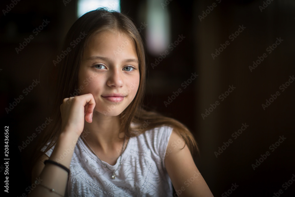 Portrait of cute ten-year-old girl posing for the camera. Stock Photo ...
