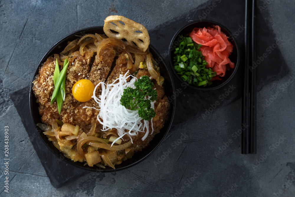 Rice bowl topped with fried pork cutlet Katsudon, tonkatsu donburi ...