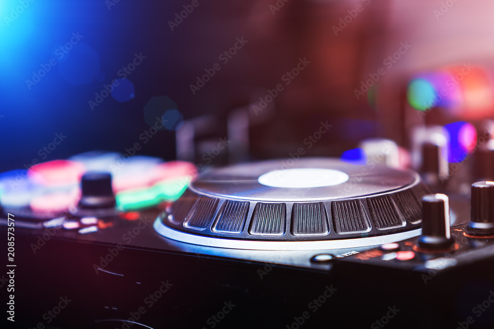 Audio Control Panel with closeup stereo pair in night club. DJ ...