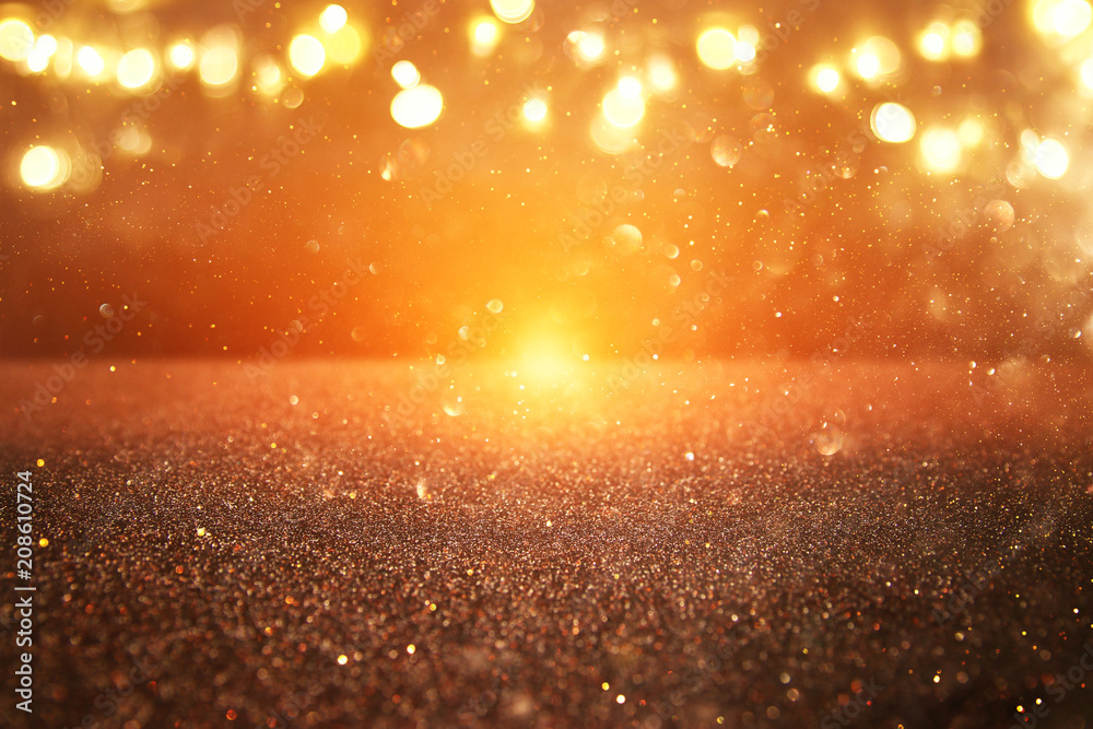 Red and gold glitter vintage lights background. defocused. Stock Photo ...