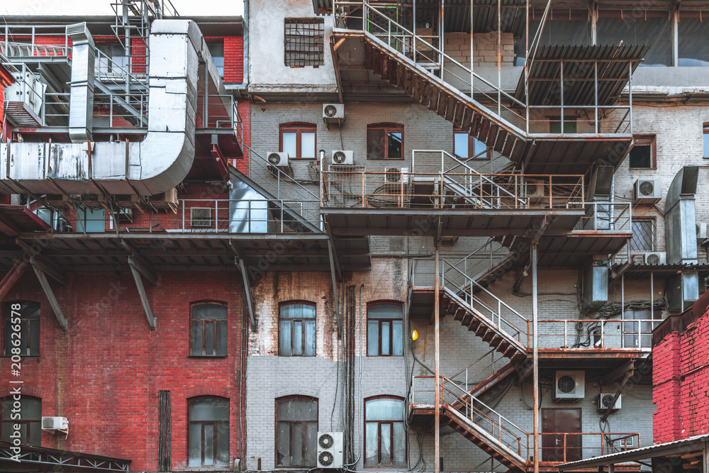 Foto de The brick facade of an old atmospheric building in an ...