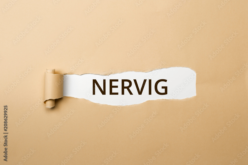 NERVIG Schriftzug - aufgerissenes Papier Stock Photo | Adobe Stock